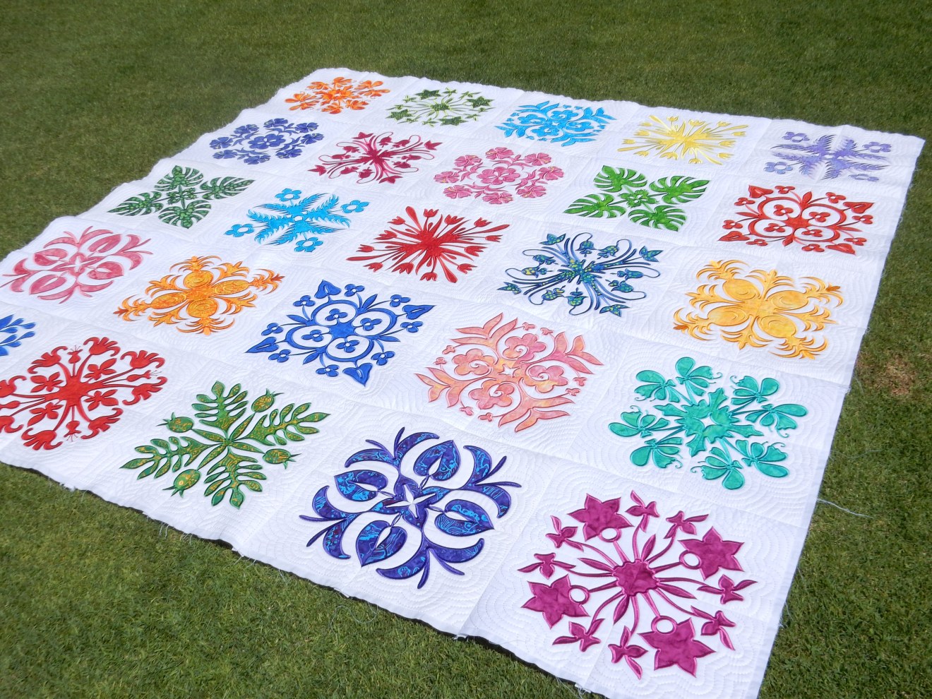 25 Hawaiian quilt blocks = a quilt top! – handmade by Carole Carr